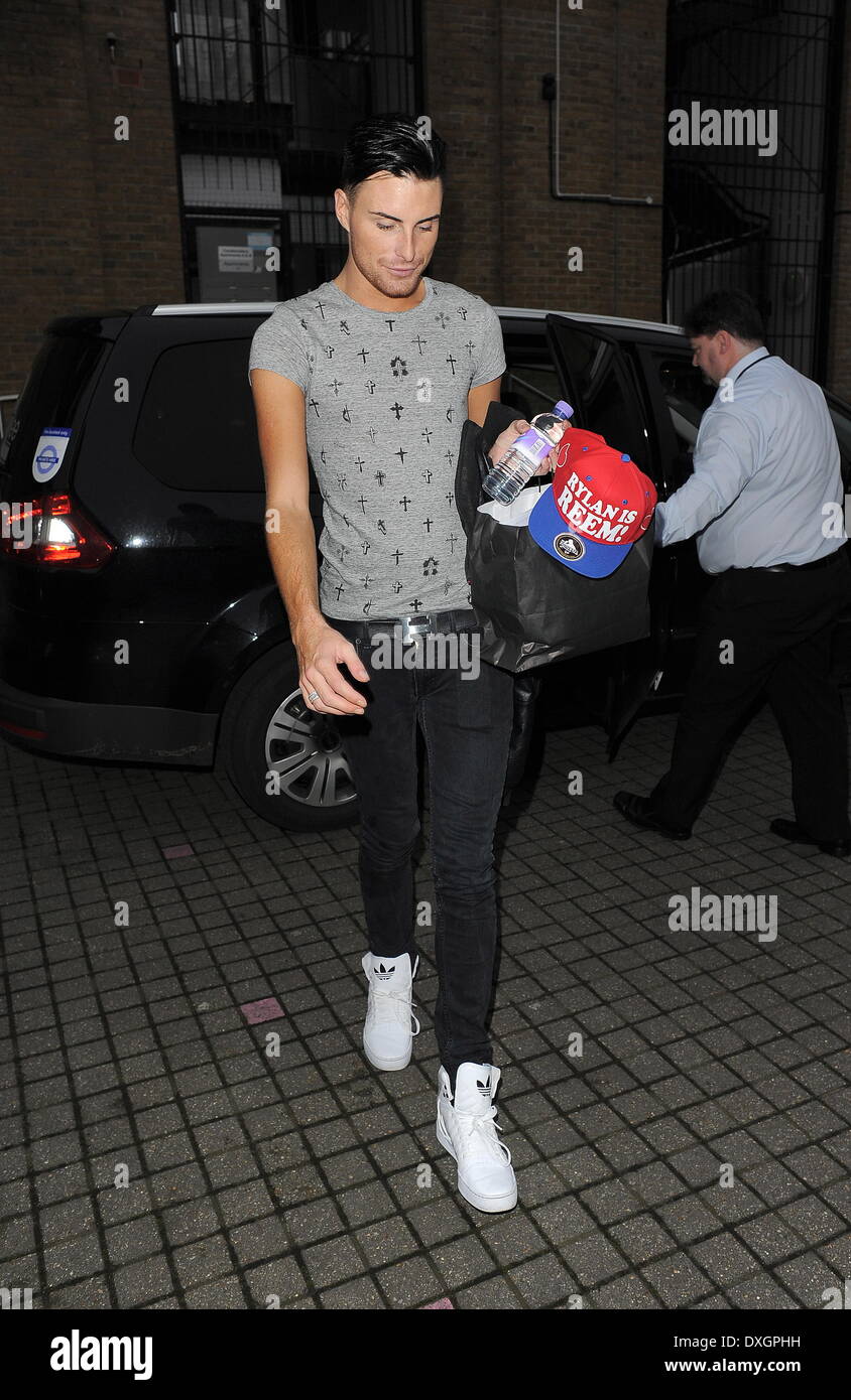 X Factor contestant Rylan Clark leaving a dance studio, holding a ...