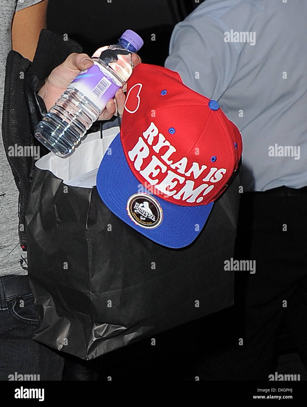 X Factor contestant Rylan Clark leaving a dance studio, holding a ...