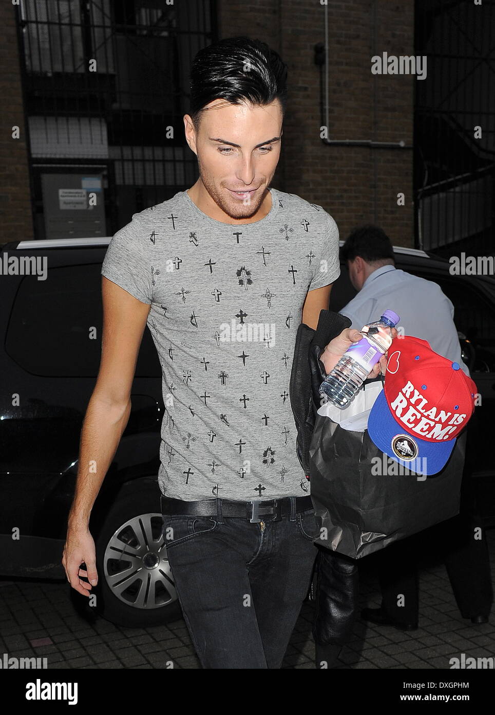 X Factor contestant Rylan Clark leaving a dance studio, holding a ...