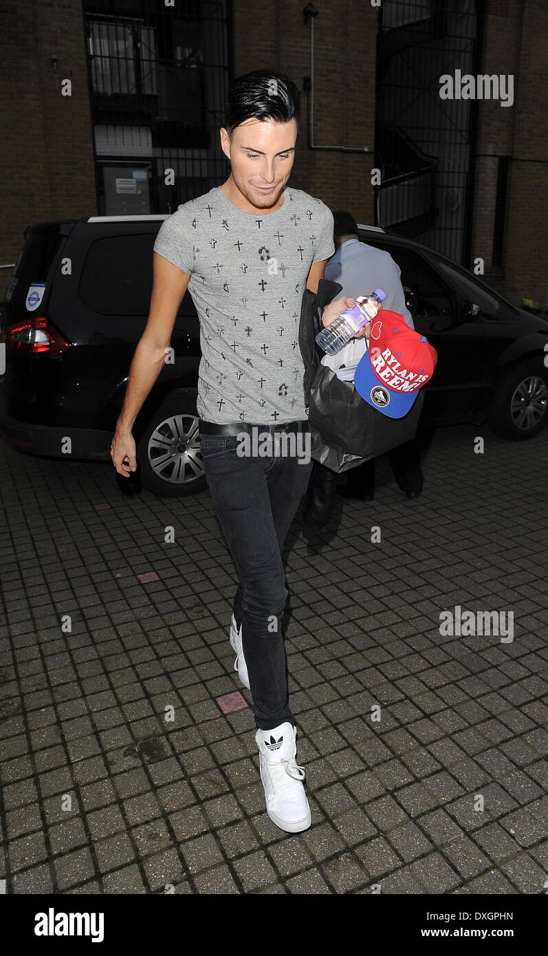 X Factor contestant Rylan Clark leaving a dance studio, holding a ...