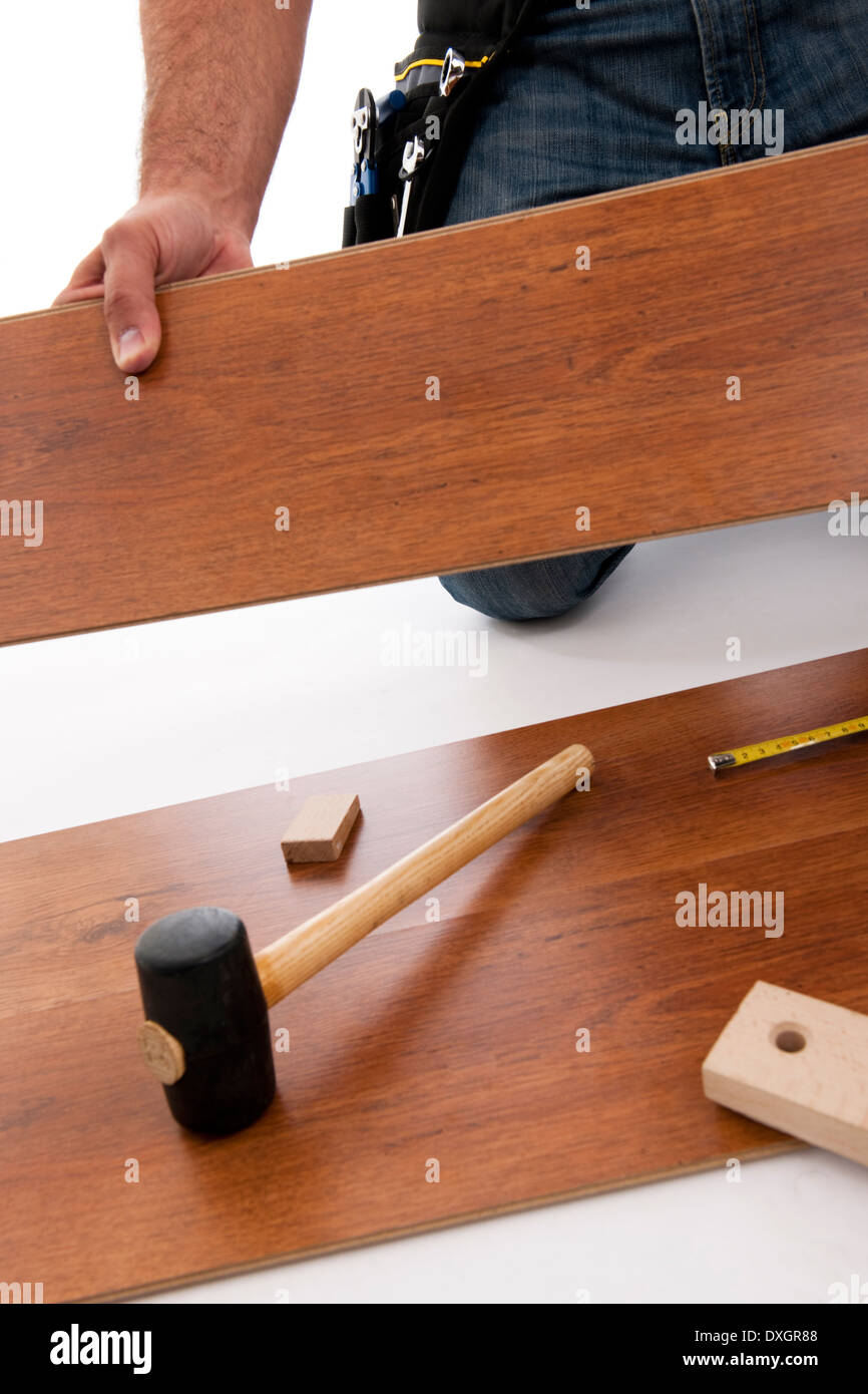 Carpenter working with wood planks Stock Photo - Alamy