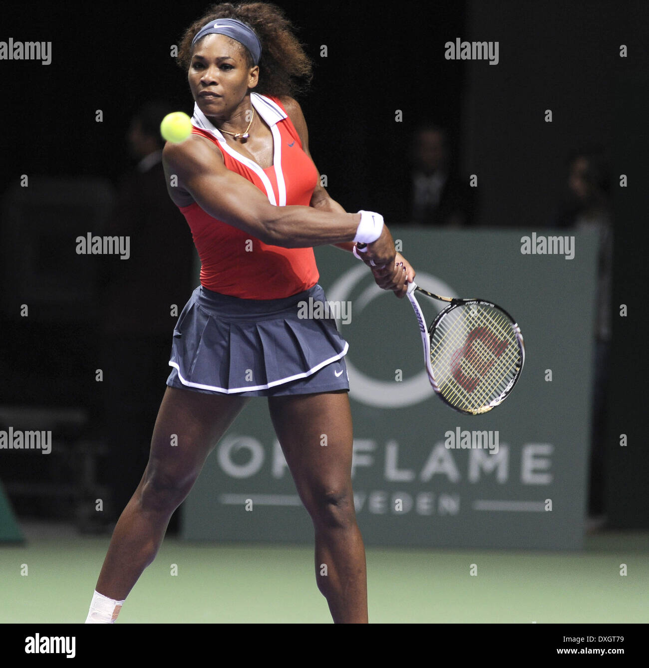 Serena Williams (USA) returns a ball to Agnieszka Radwanska (POL) during the WTA Championships ...