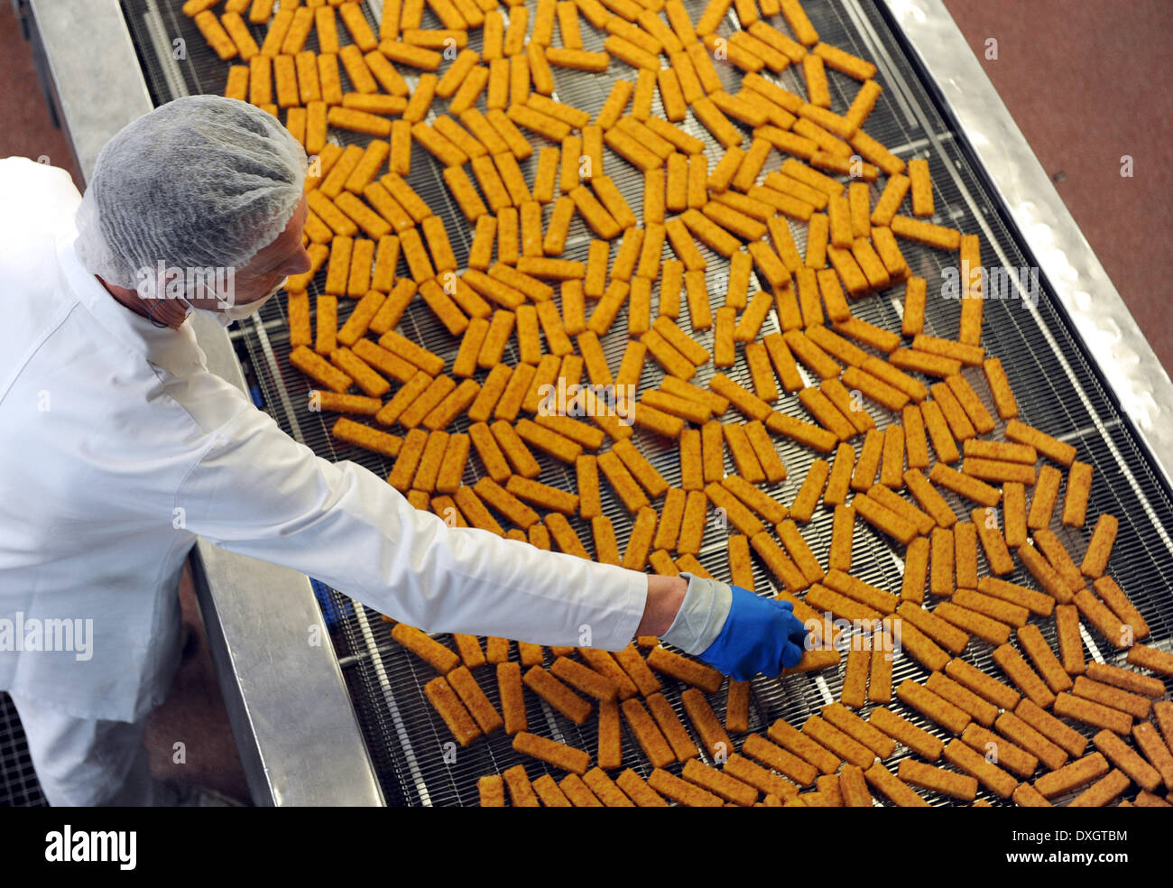 Bremerhaven, Germany. 26th Mar, 2014. A member of staff inspects the ...
