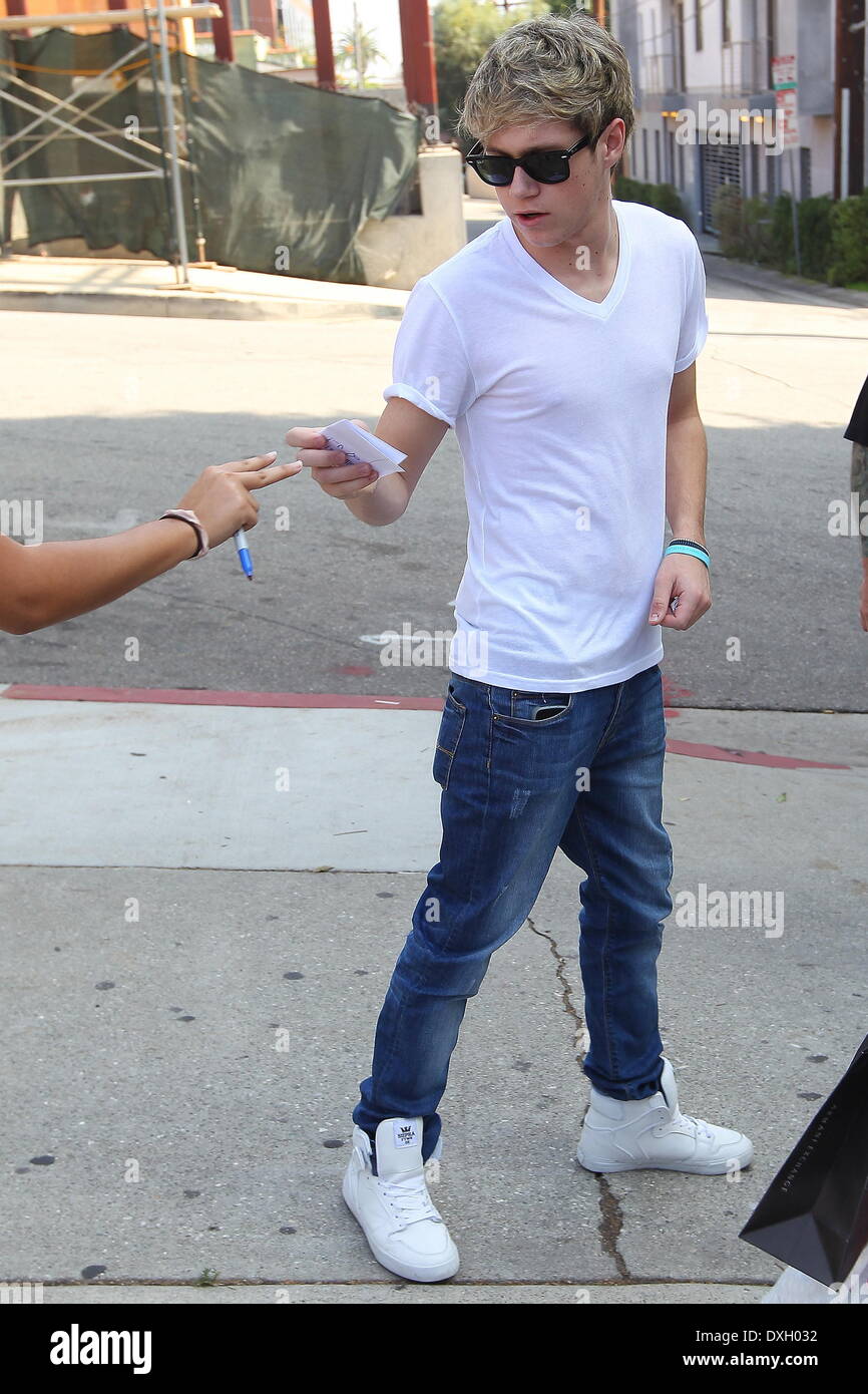 Niall Horan of One Direction seen out shopping at Armani Exchange and H ...