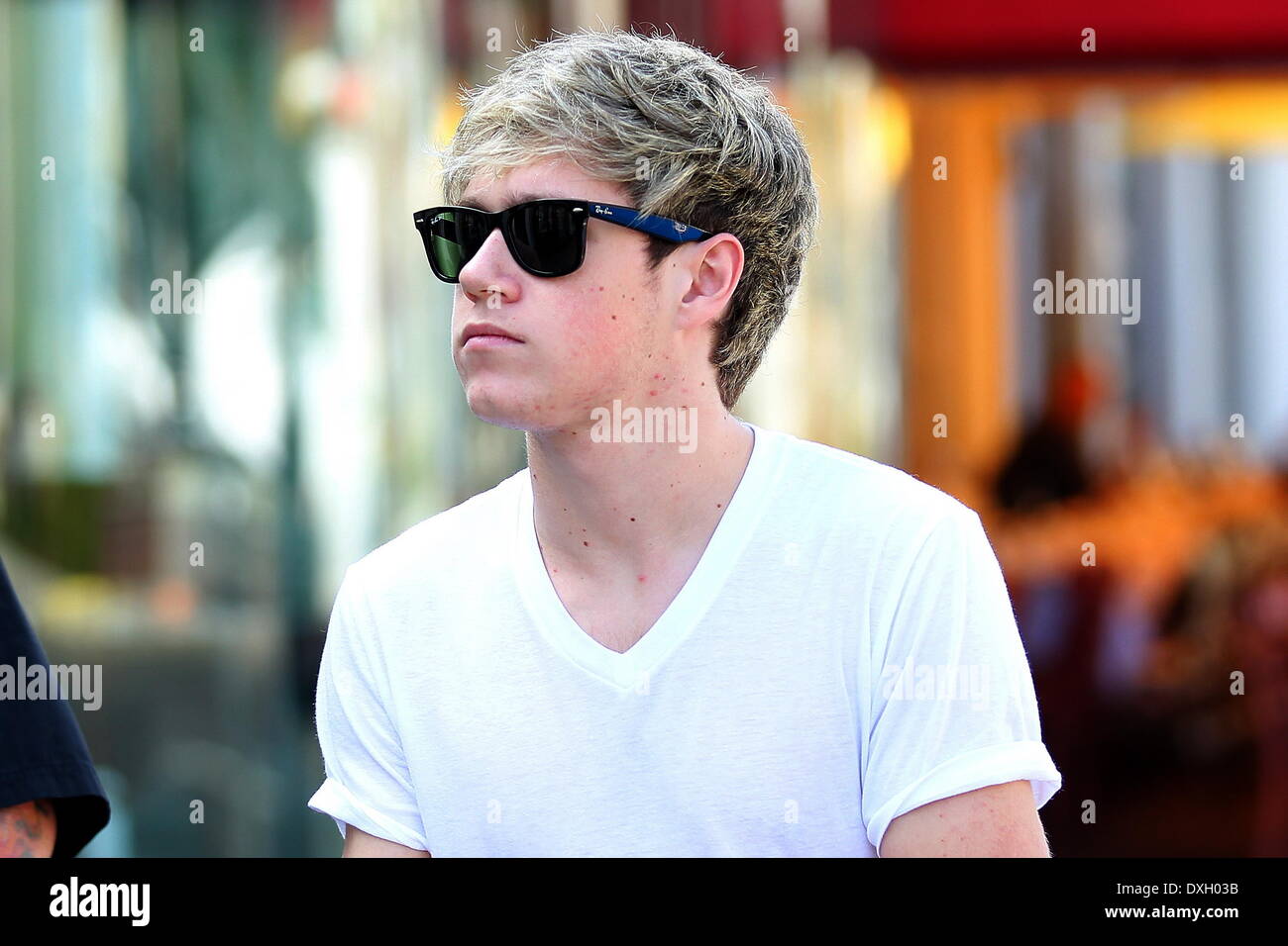 Niall Horan of One Direction seen out shopping at Armani Exchange and H ...