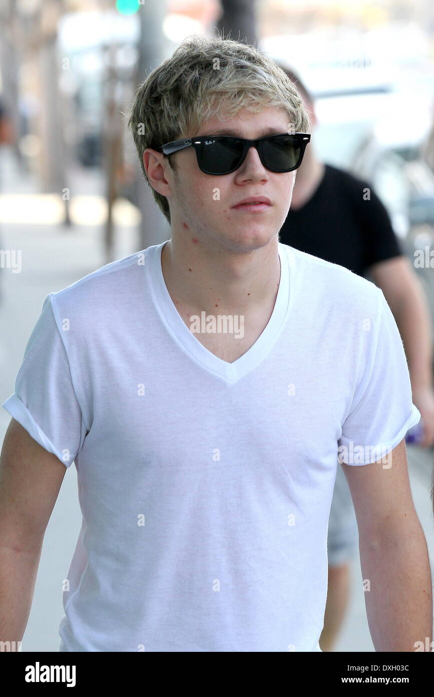 Niall Horan of One Direction seen out shopping at Armani Exchange and H ...