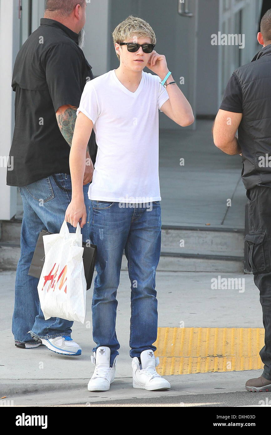 Niall Horan of One Direction seen out shopping at Armani Exchange and H ...