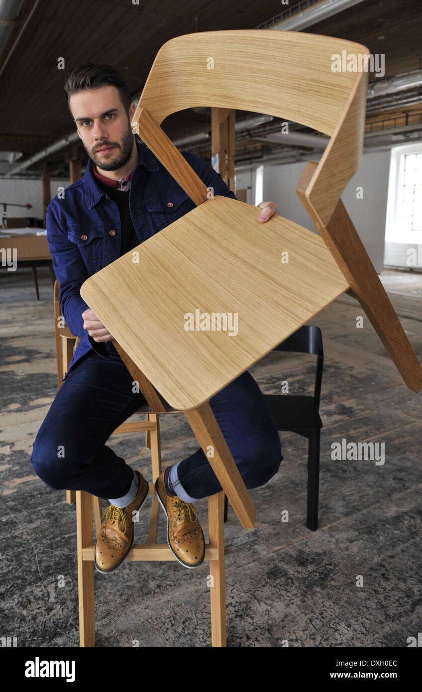 Director of Marketing of TON company Jan Juza shows chairs that will be ...