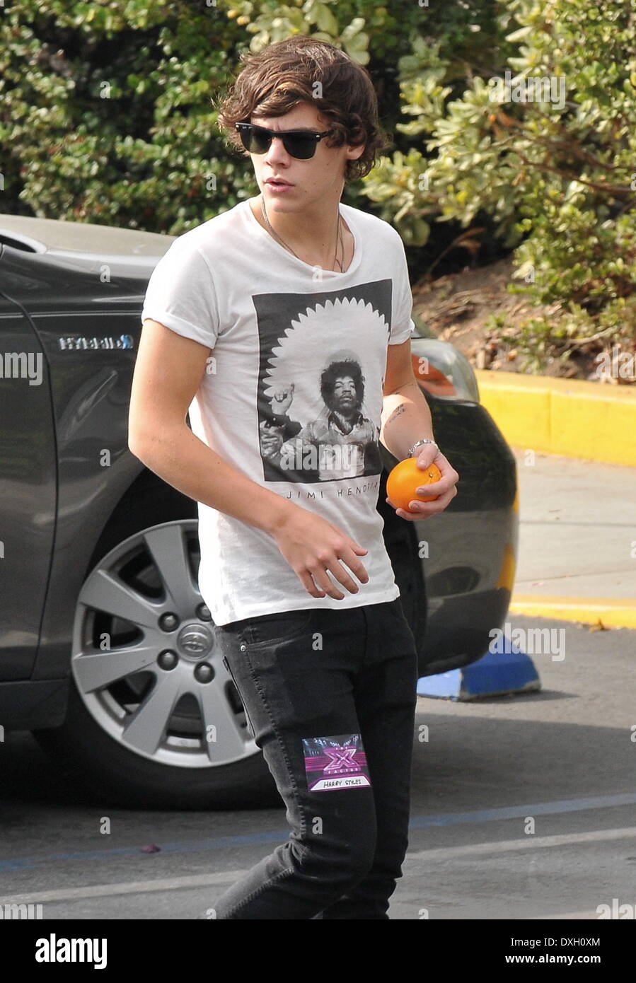 Harry Styles One Direction band members arriving at the X Factor studio ...