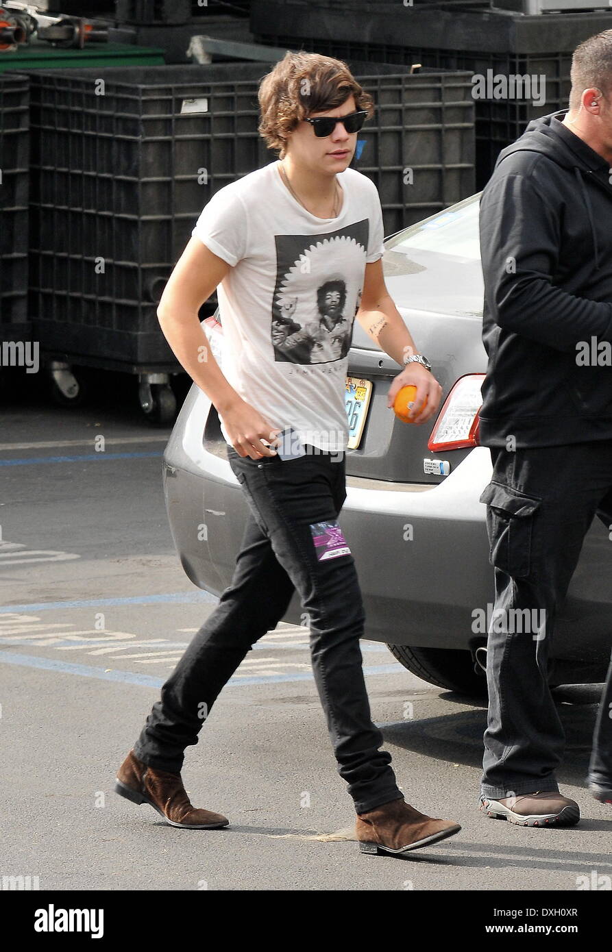 Harry Styles One Direction band members arriving at the X Factor studio ...