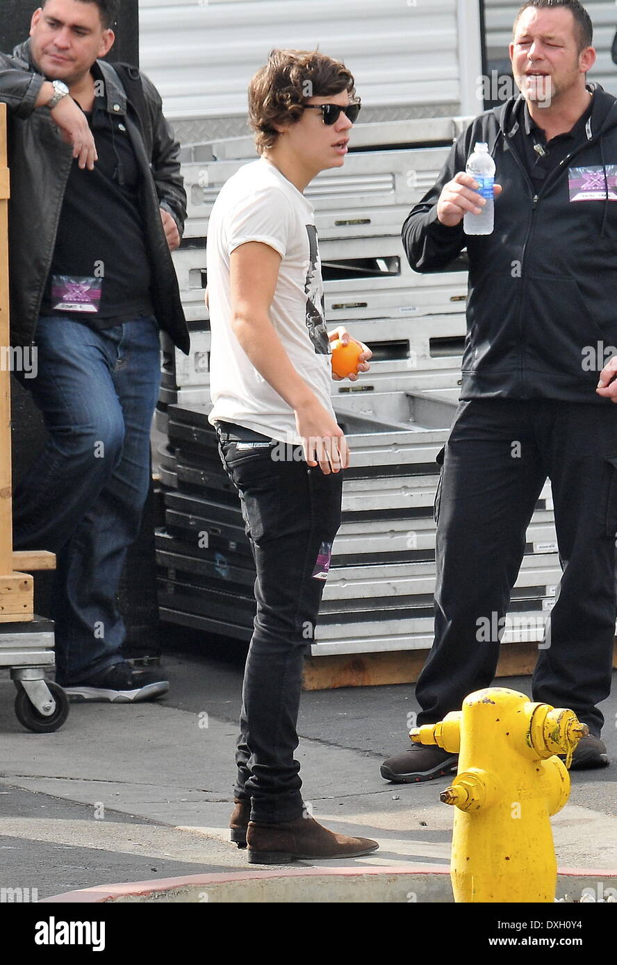 Harry Styles One Direction band members arriving at the X Factor studio ...