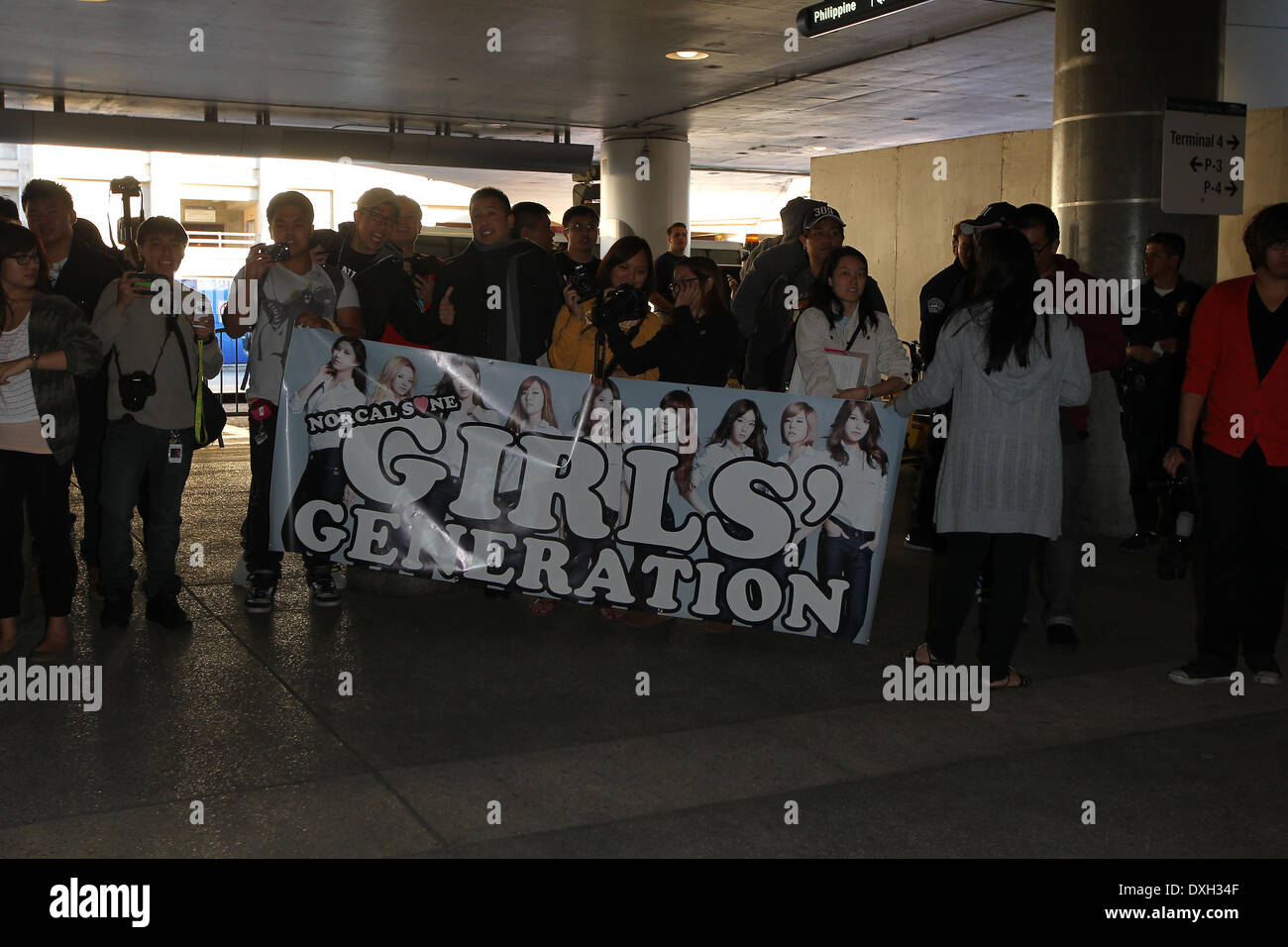 Girls' Generation fans with a large banner The nine-member South Korean ...
