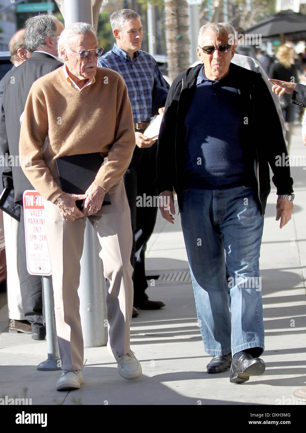 Stan Lee walking with a friend in Beverly Hills Los Angeles, California ...