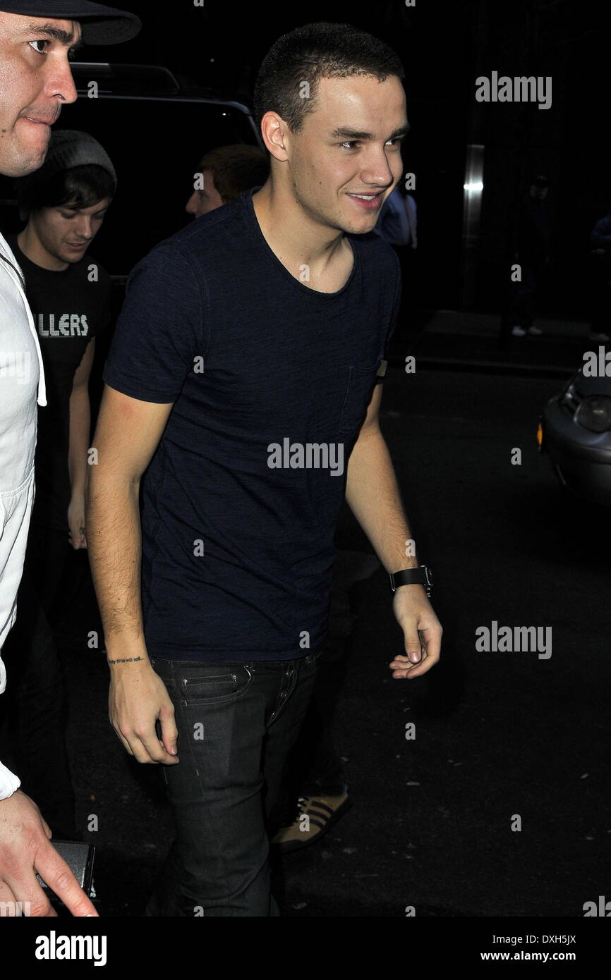 Liam Payne One Direction exits Toys 'R' Us in Times Square with nerf ...