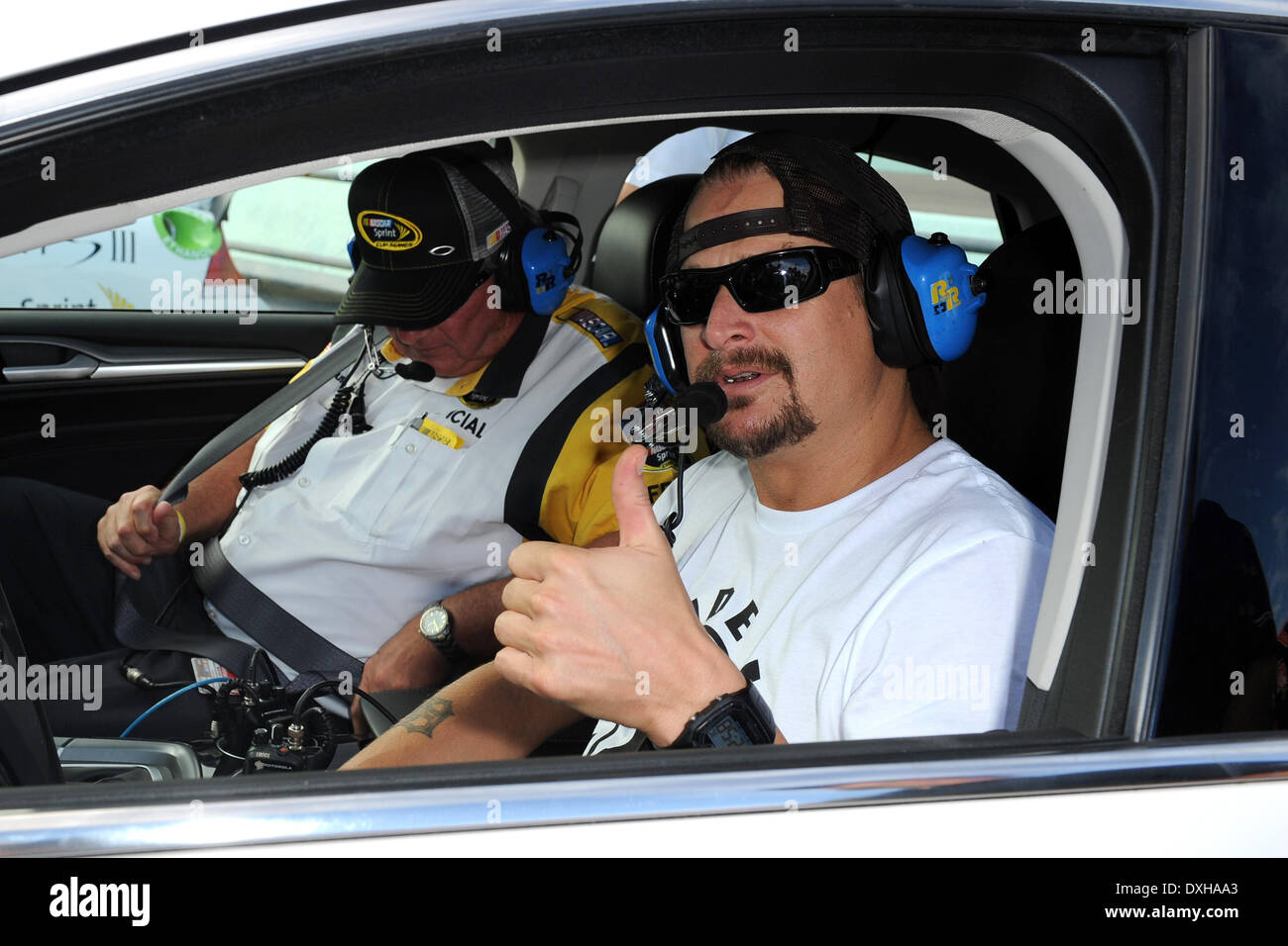 Kid Rock drives the pace car to the start the Sprint Cup Series Ford ...