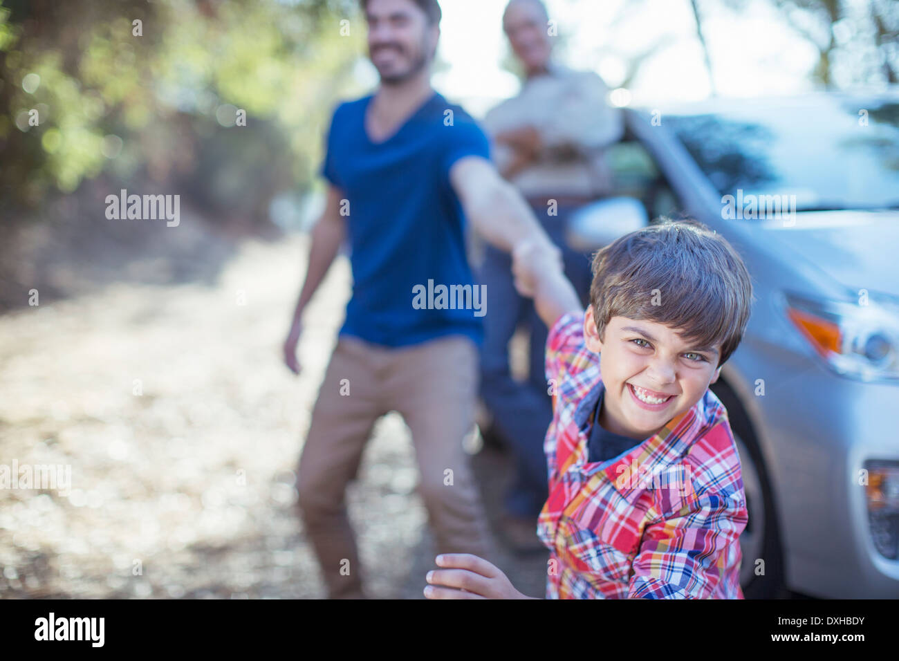 Boy dragging car hi-res stock photography and images - Alamy