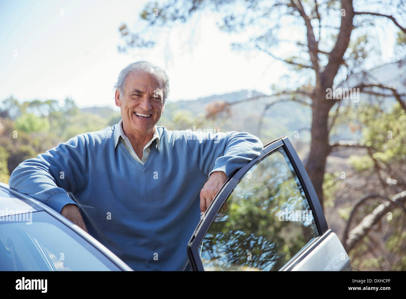 Person leaning on car hi-res stock photography and images - Alamy