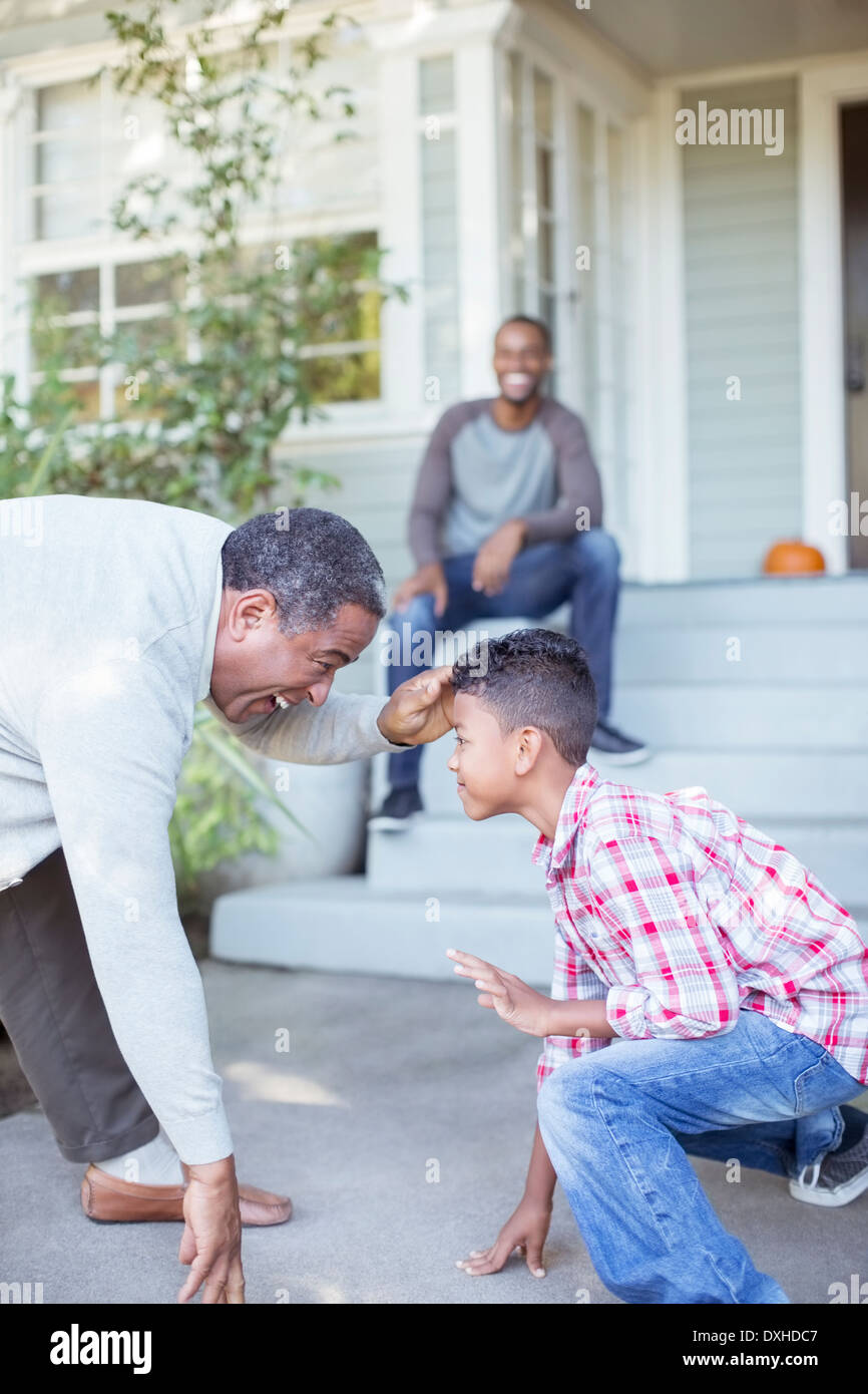 Child grandparent stoop hi-res stock photography and images - Alamy