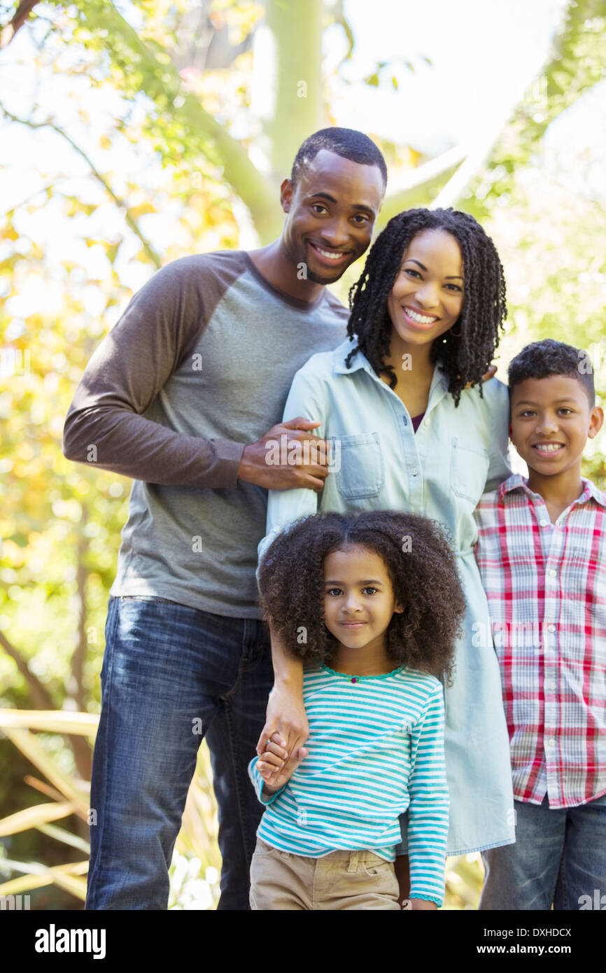 Portrait of smiling family outdoors Stock Photo - Alamy