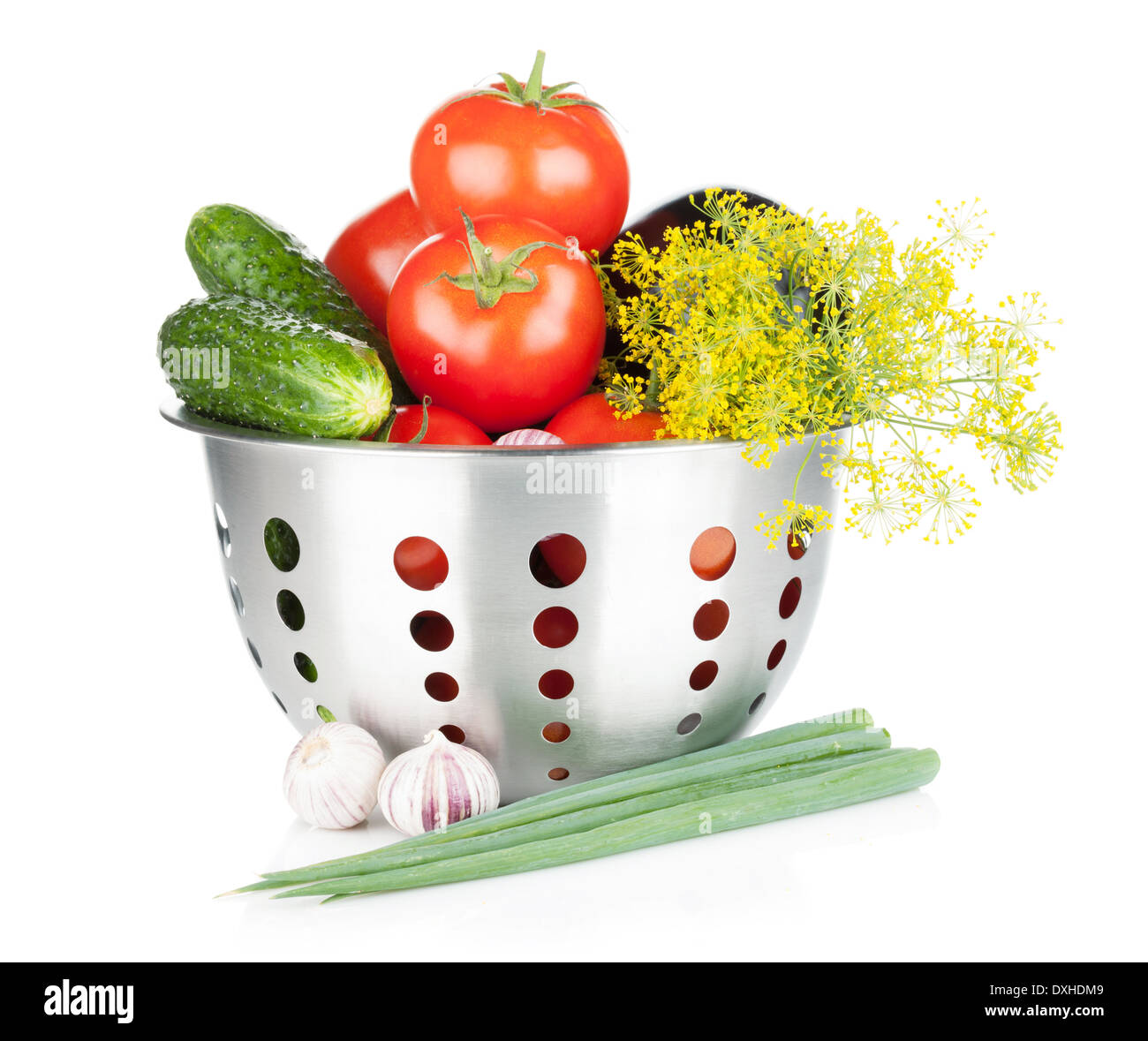 Fresh ripe vegetables in colander. Isolated on white background Stock ...