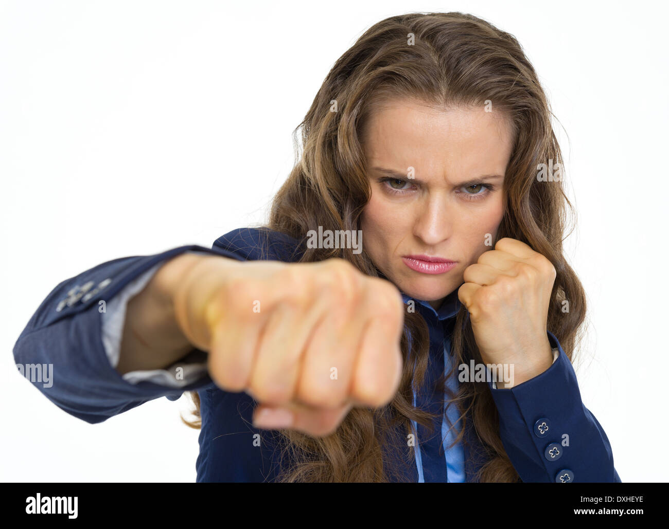 Serious business woman punching in camera Stock Photo - Alamy