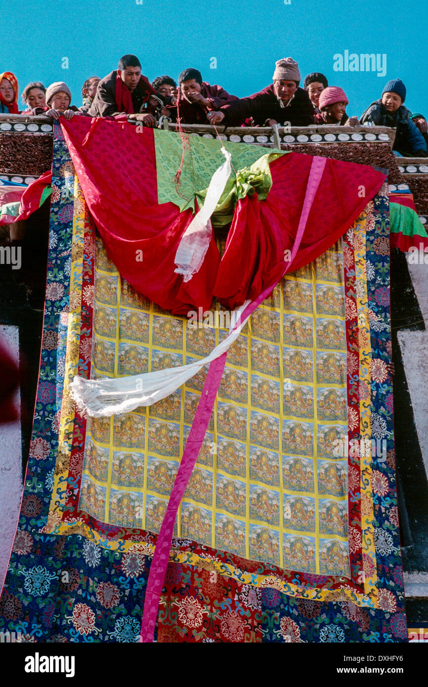 Religious Thankas and decorative silk banners are unrolled from the ...