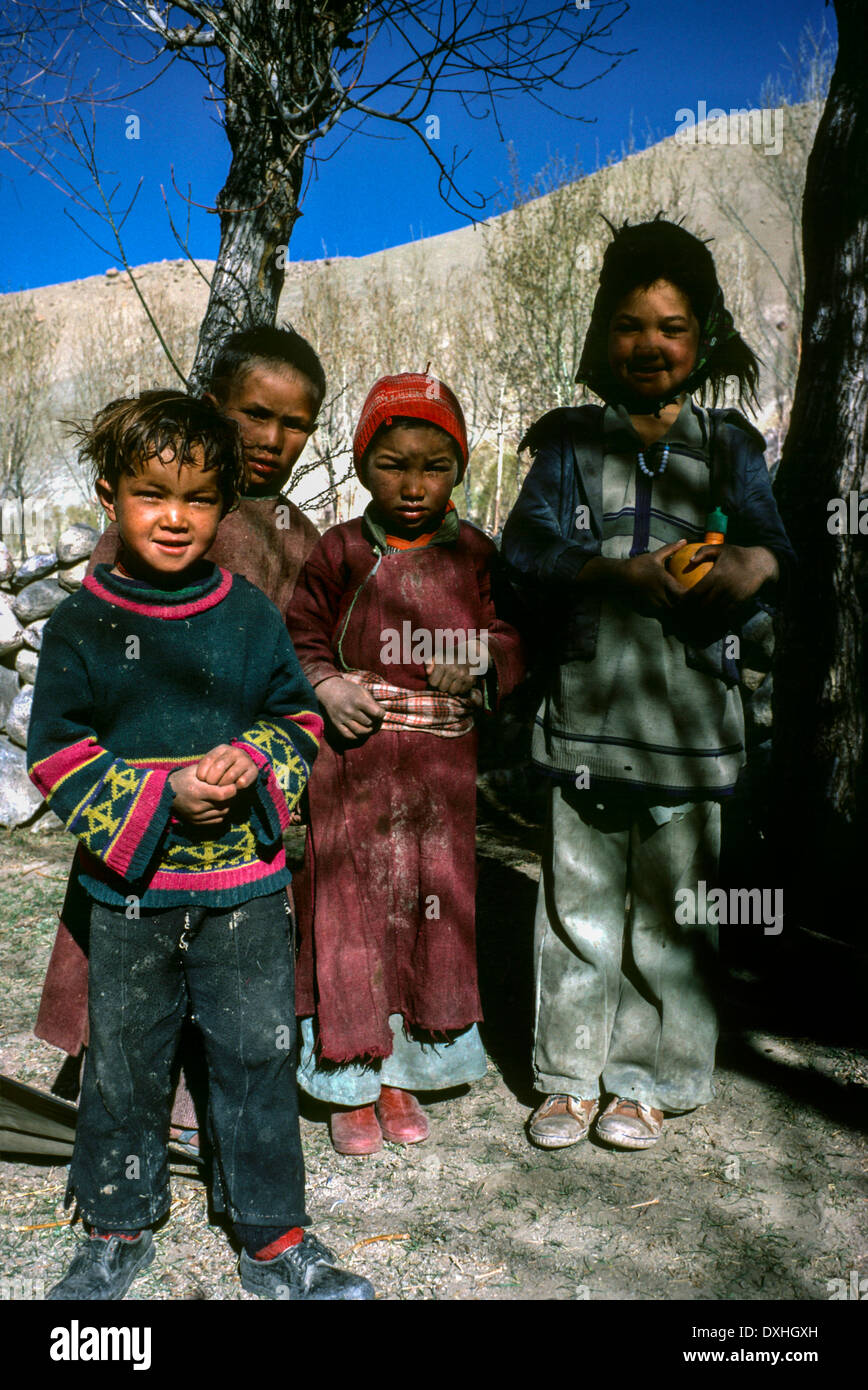 Ladakh village children girls boys standing sunshine shadow goncha ...