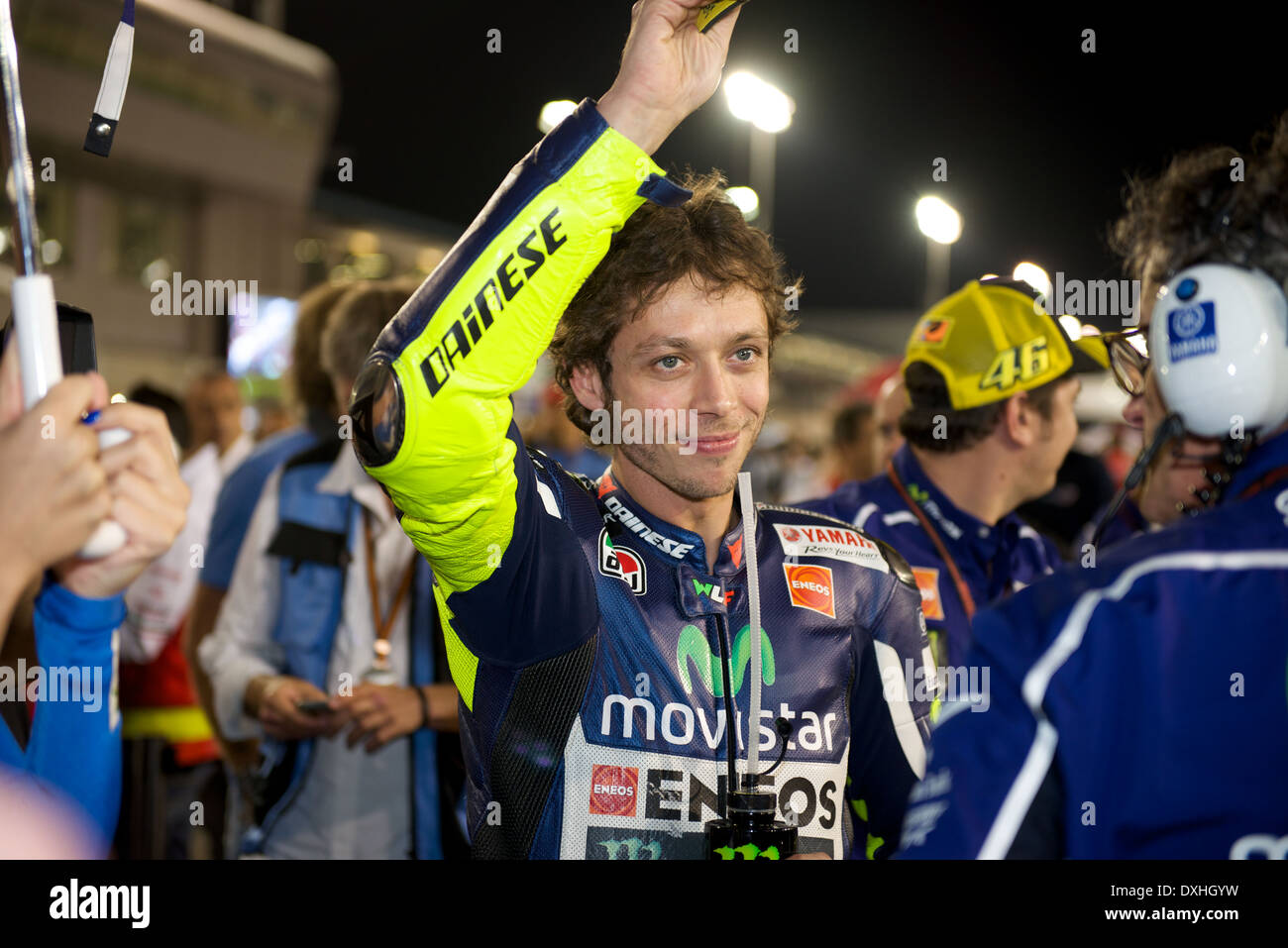 Losail International Circuit, Qatar. MotoGP riders wait on start grid ...