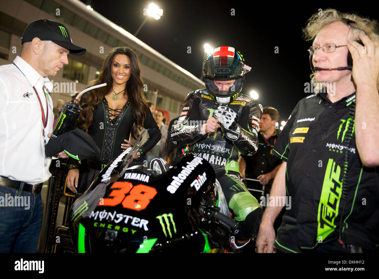 Losail International Circuit, Qatar. MotoGP riders wait on start grid ...