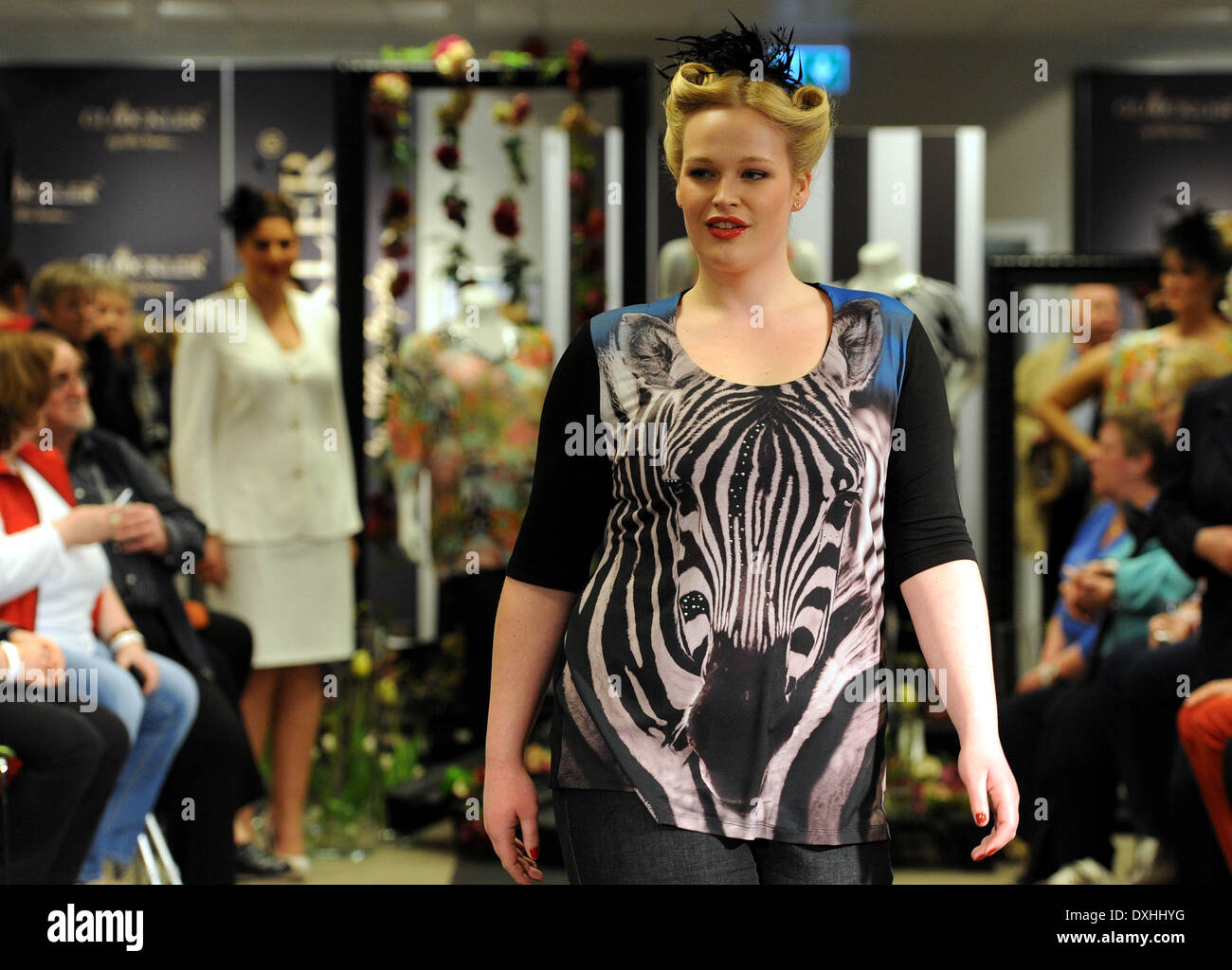 Rastede, Germany. 26th Mar, 2014. Models present the new collection of ...