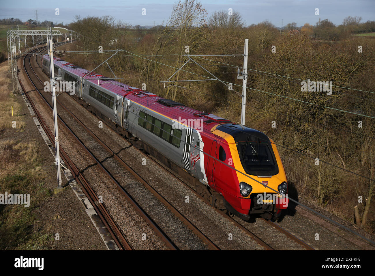 Virgin train at high speed Stock Photo - Alamy