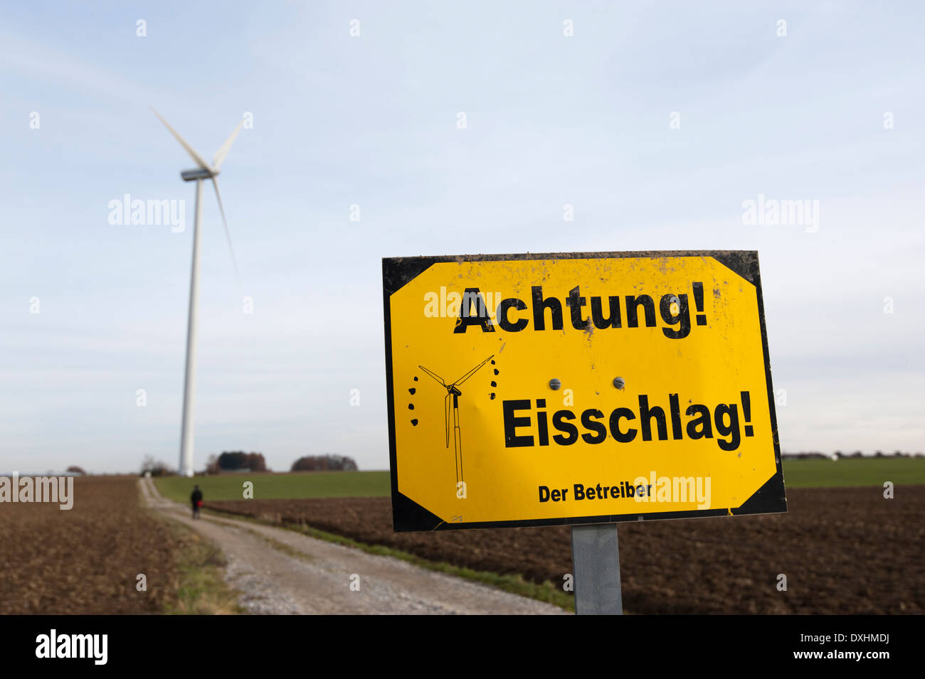 "Beware of Icefall" sign in front of a wind power generator Stock Photo ...