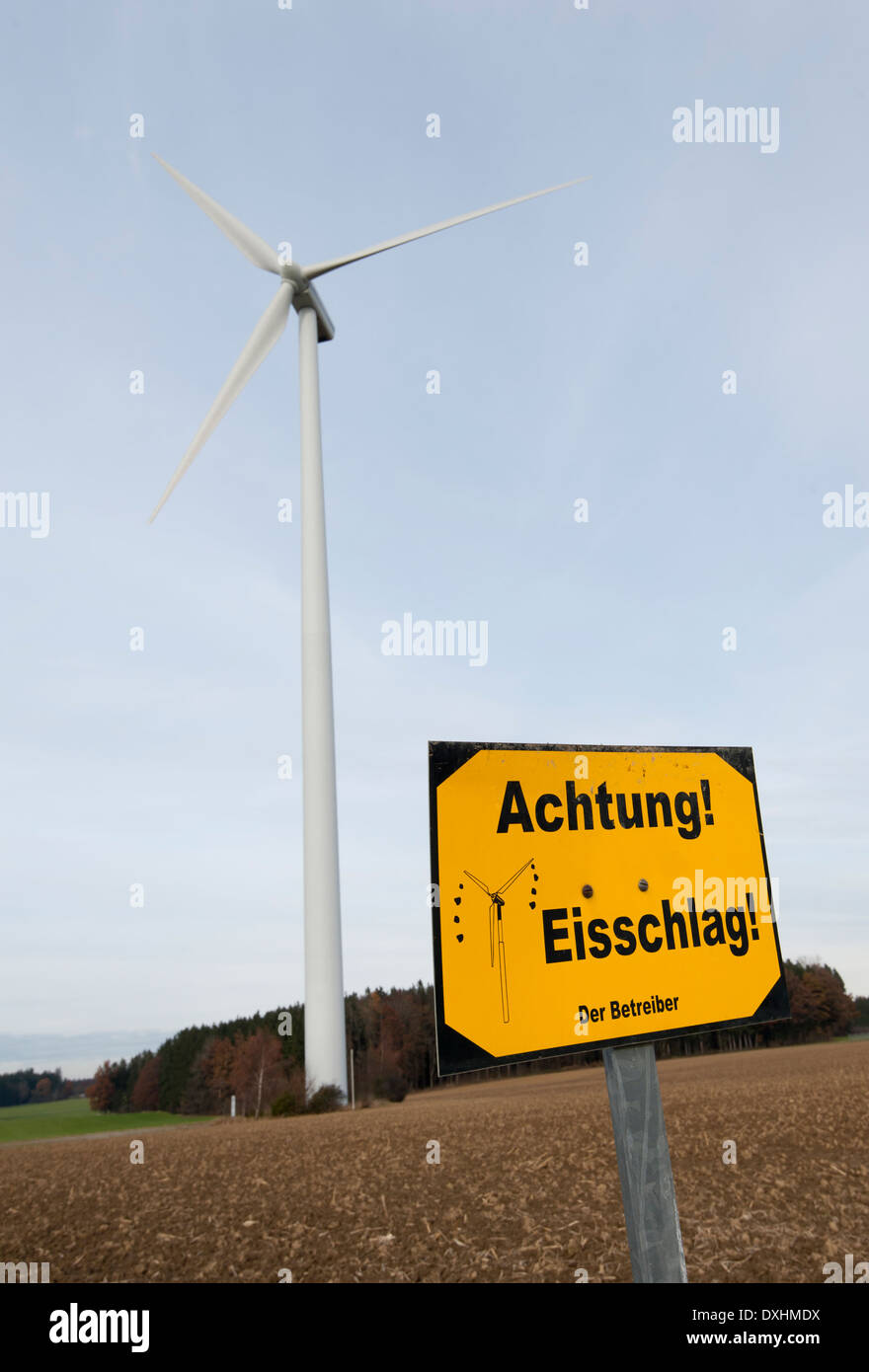 "Beware of Icefall" sign in front of a wind power generator Stock Photo ...