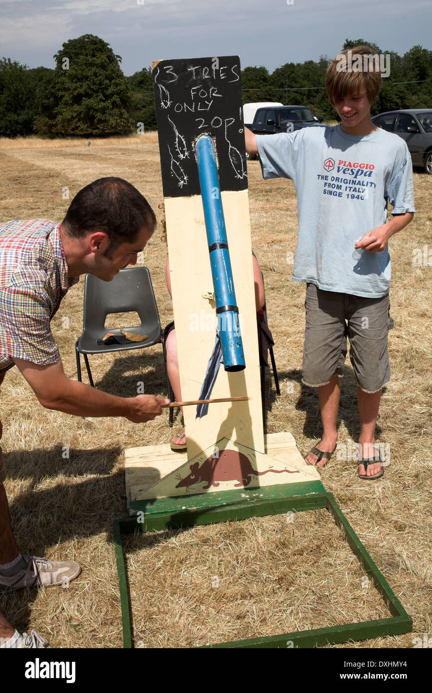 Catch the rat summer fete sideshow game, Butley, Suffolk, England Stock ...