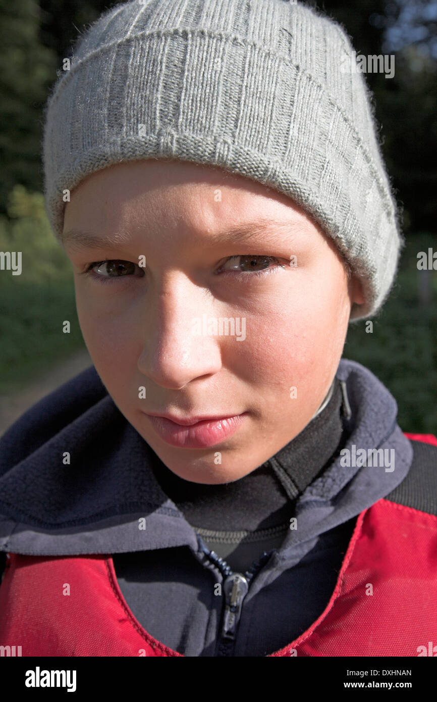 Model Released Young boy wearing grey woolly beanie hat and sailing ...
