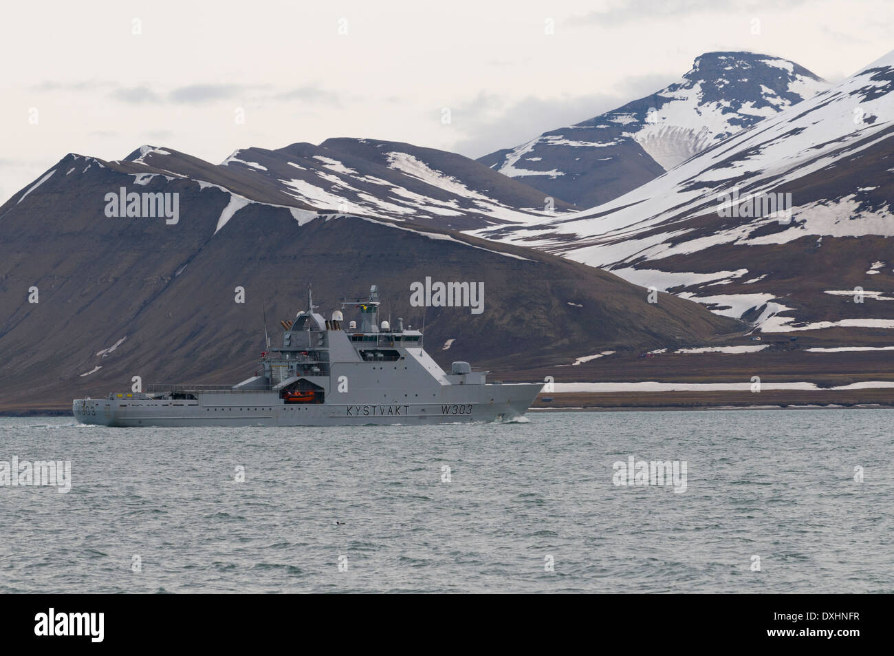 A Norwegian navy vessel patrols the waters of Svalbard. Isfjorden Stock ...