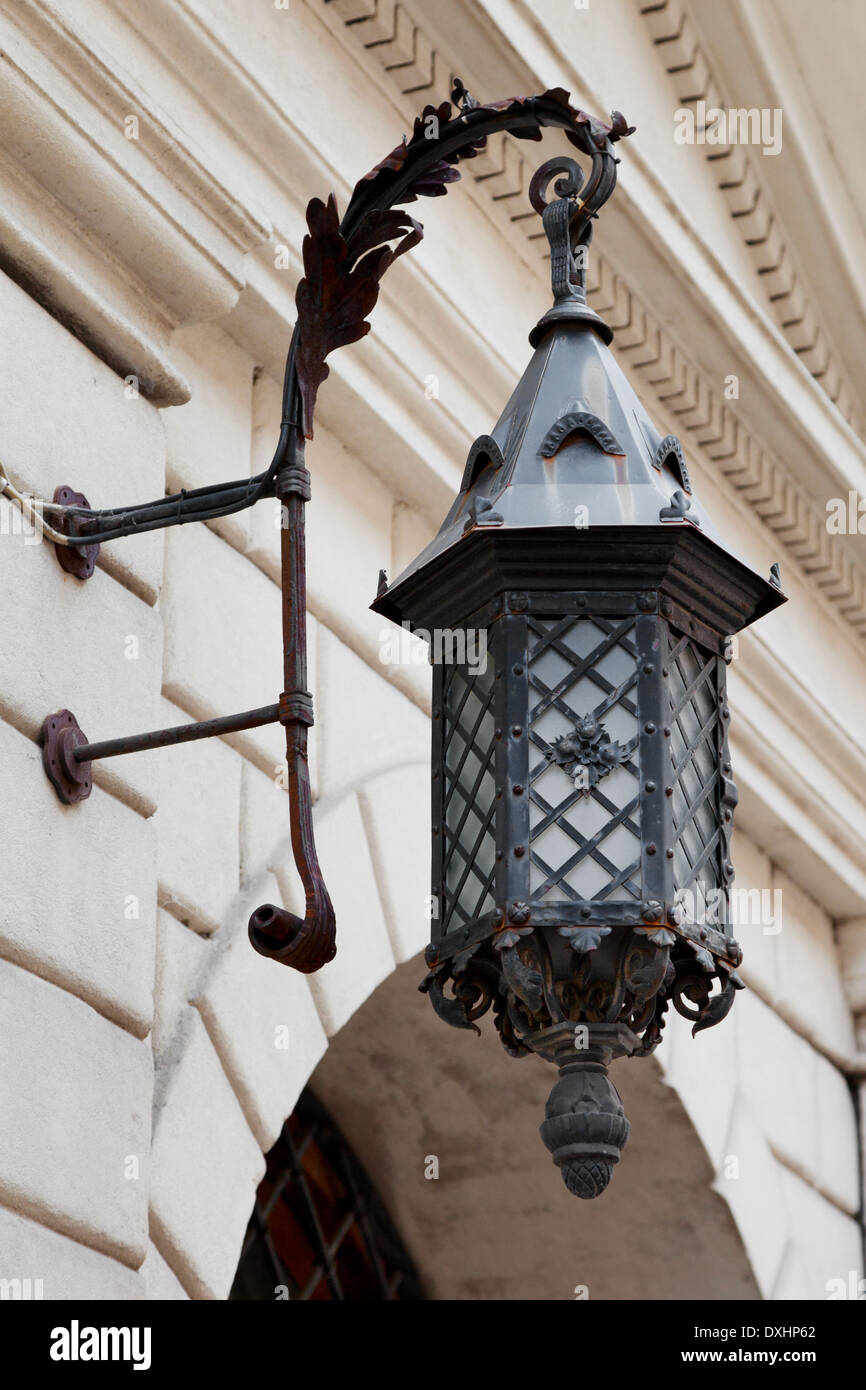 decorative street lamp on building wall Stock Photo - Alamy