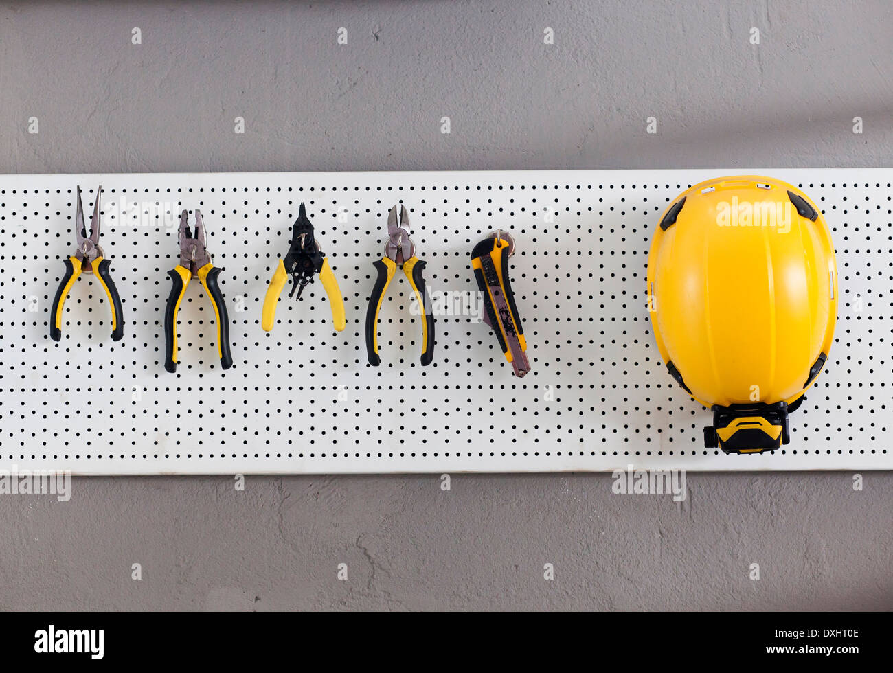 Set of tools on the wall cupboard Stock Photo - Alamy