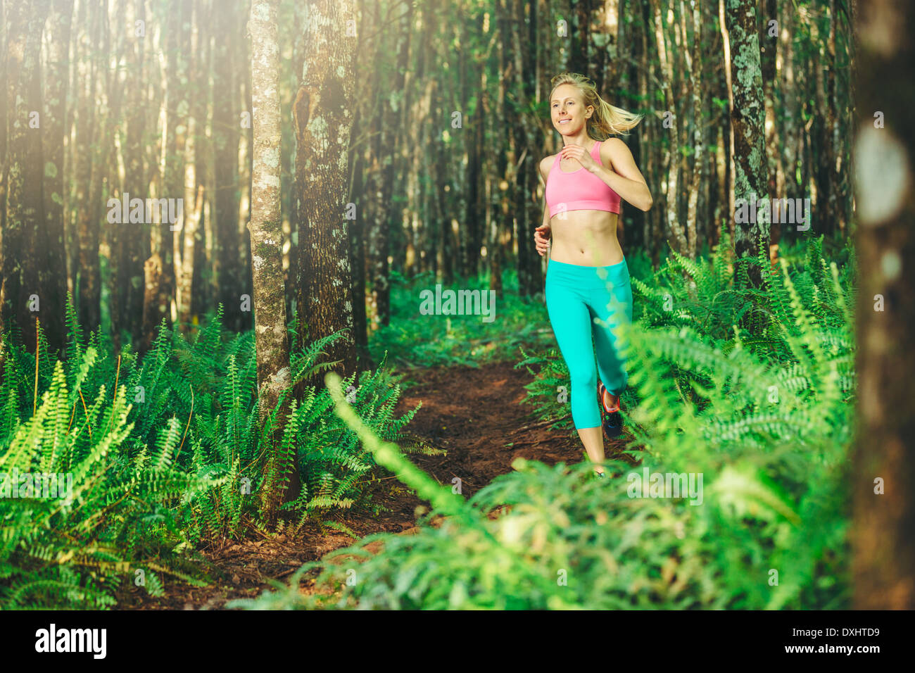 Woman Running in Nature. Trail Running in Forest. Active Healthy ...