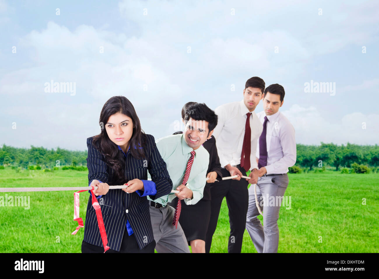 Indian Business People Pulling Rope Stock Photo - Alamy