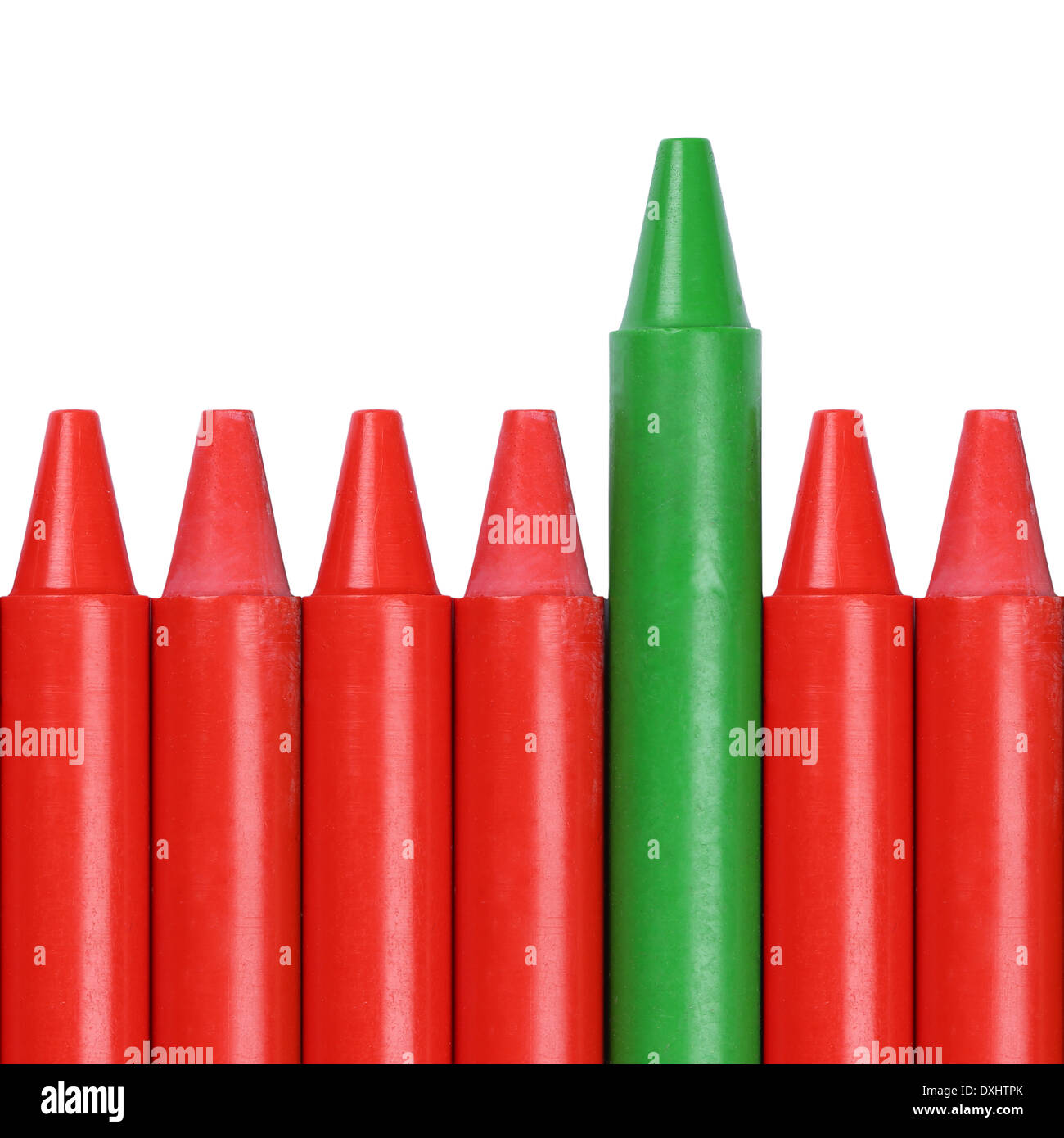 Green crayon standing out from the crowd, success and winning in ...