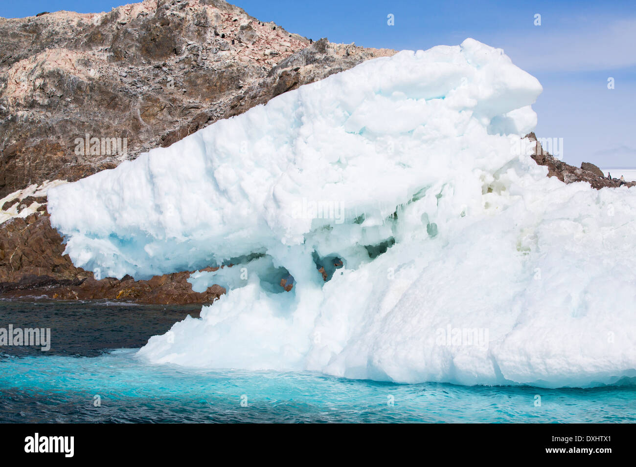 an iceberg melting in Suspiros Bay off Joinville Island just off the ...