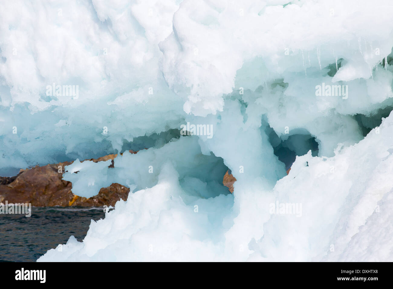 an iceberg melting in Suspiros Bay off Joinville Island just off the ...