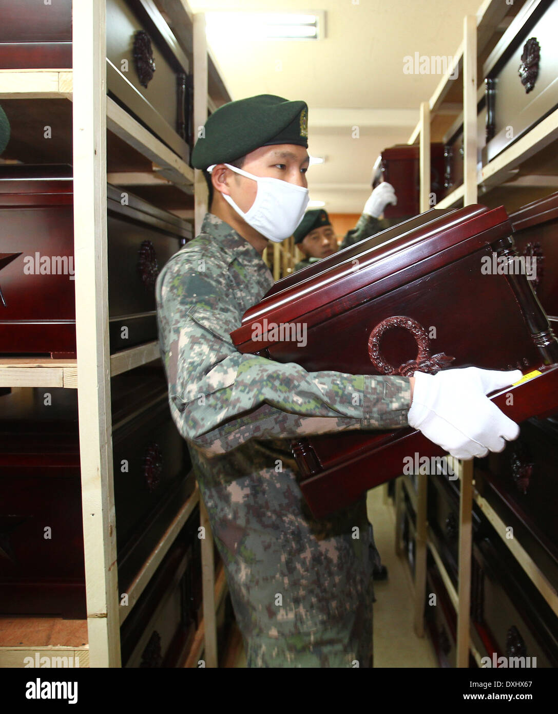 Paju, South Korea. 27th Mar, 2014. South Korean soldiers carry to ...