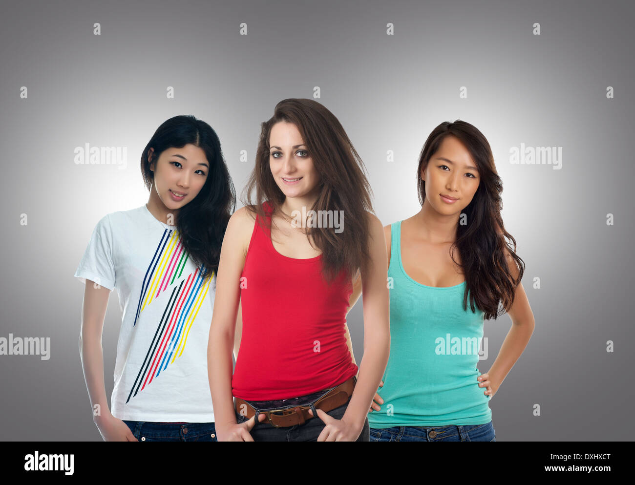 Three teenage girls wearing casual outfit together Stock Photo - Alamy