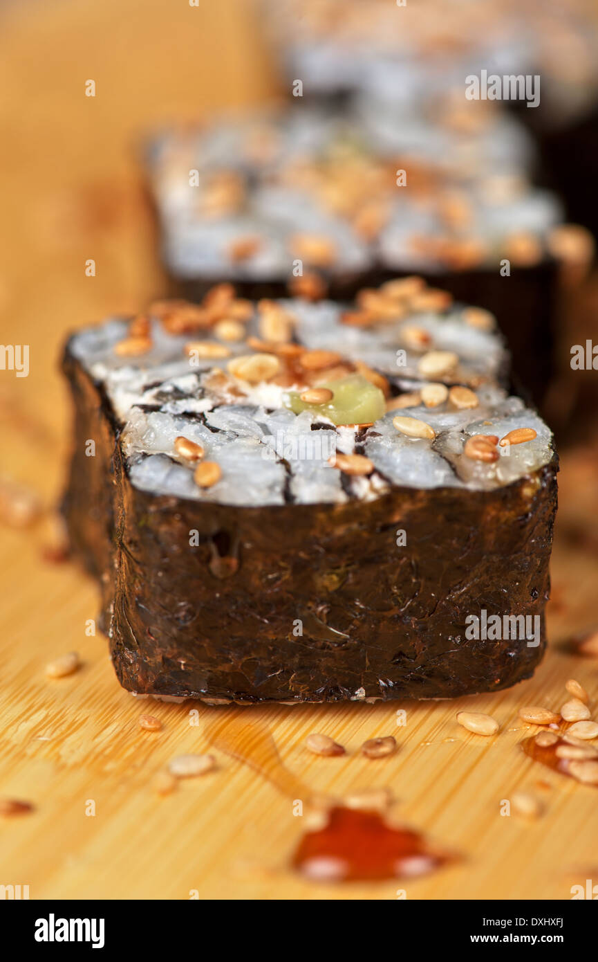 sesame sushi rolls Stock Photo - Alamy