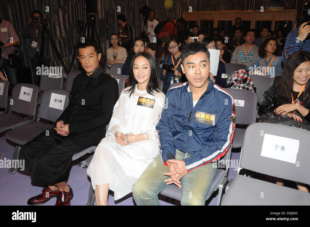 Hong Kong, China. 25th Mar, 2014. Actors Ching Wan Lau, Louis Koo and ...