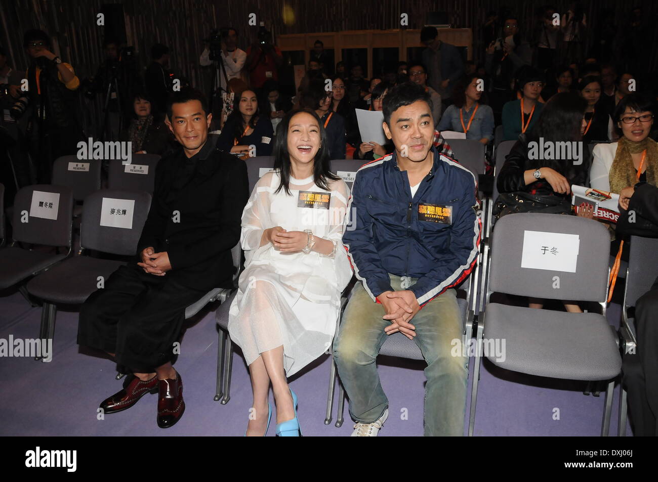 Hong Kong, China. 25th Mar, 2014. Actors Ching Wan Lau, Louis Koo and ...
