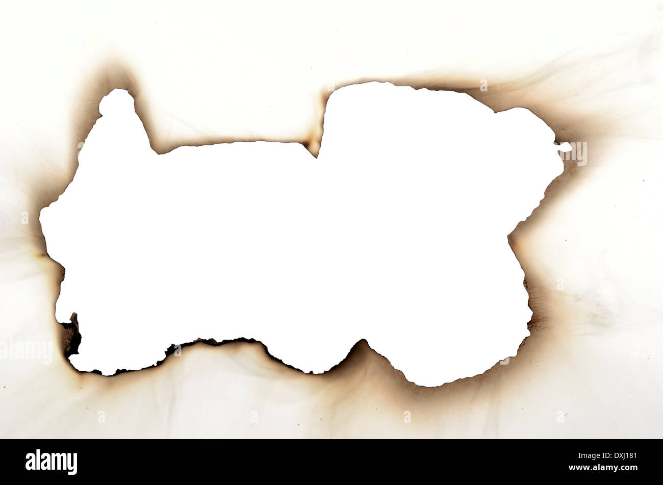 burnt hole in a paper Stock Photo - Alamy