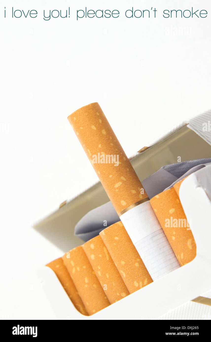 open cigarettes pack with educative message Stock Photo - Alamy